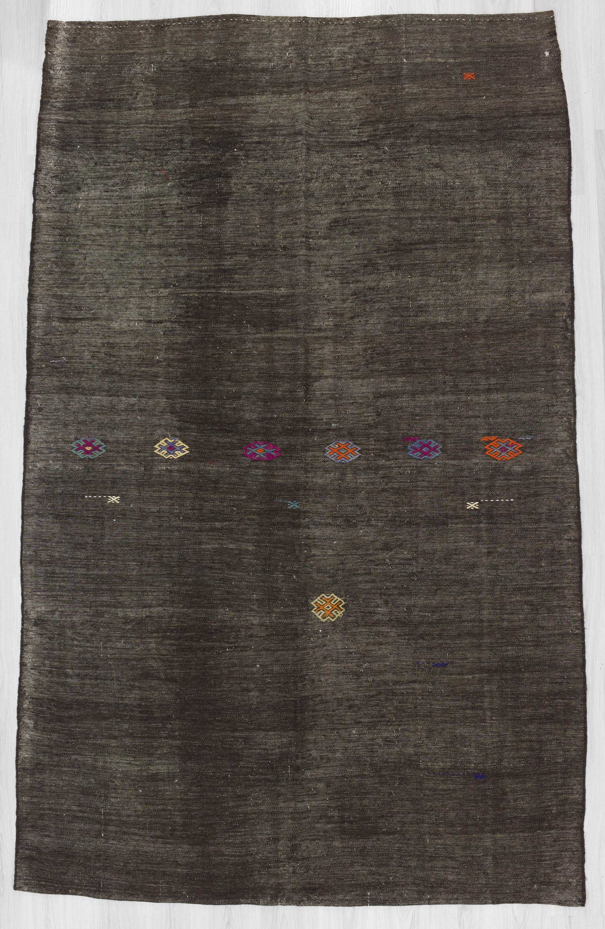 Black embroidered vintage Turkish goat hair kilim rug